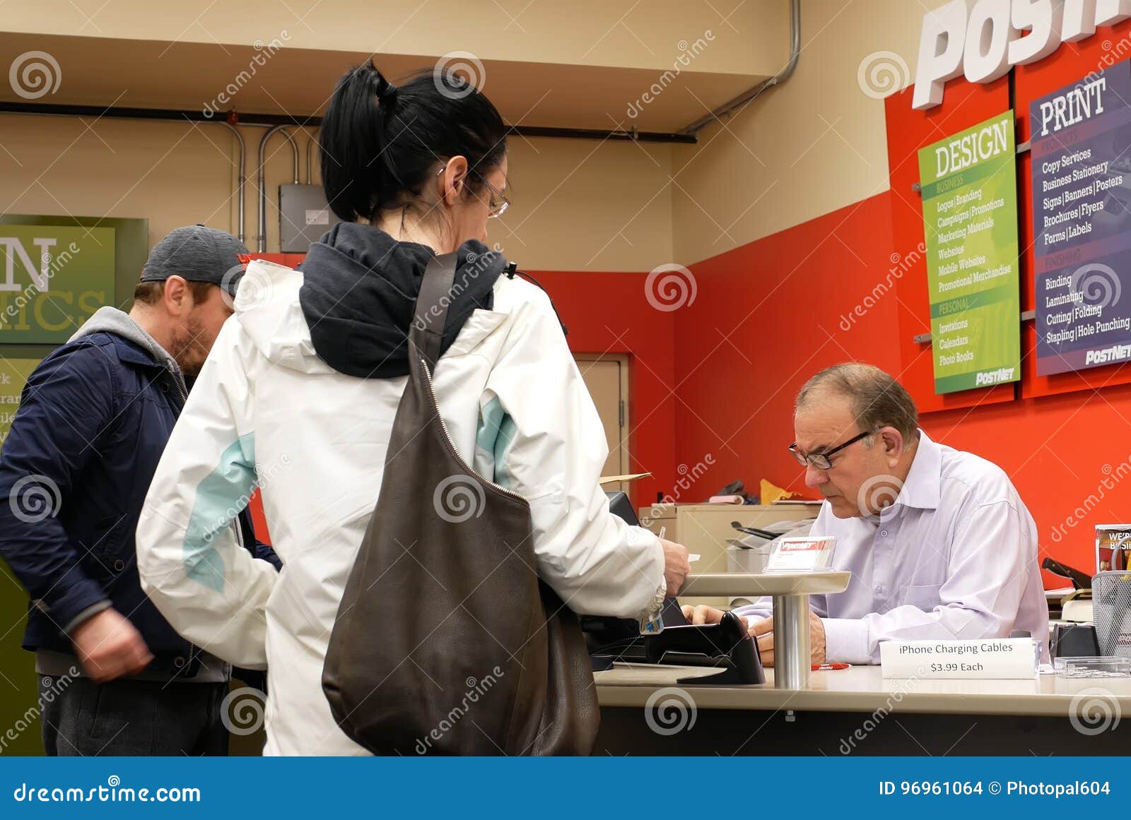 Worker Checking Parcel for Customer at Post Office Editorial Stock ...