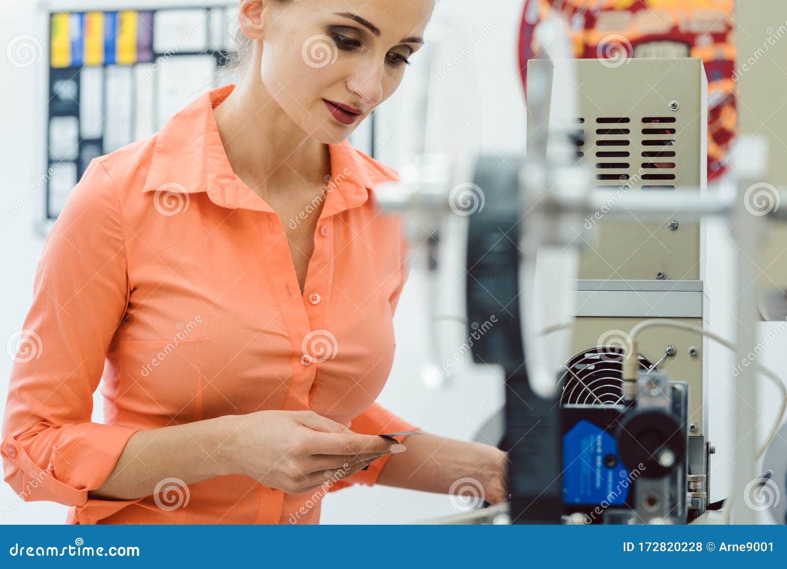 Worker Checking Textile Label Fresh from the Printing Machine Stock ...