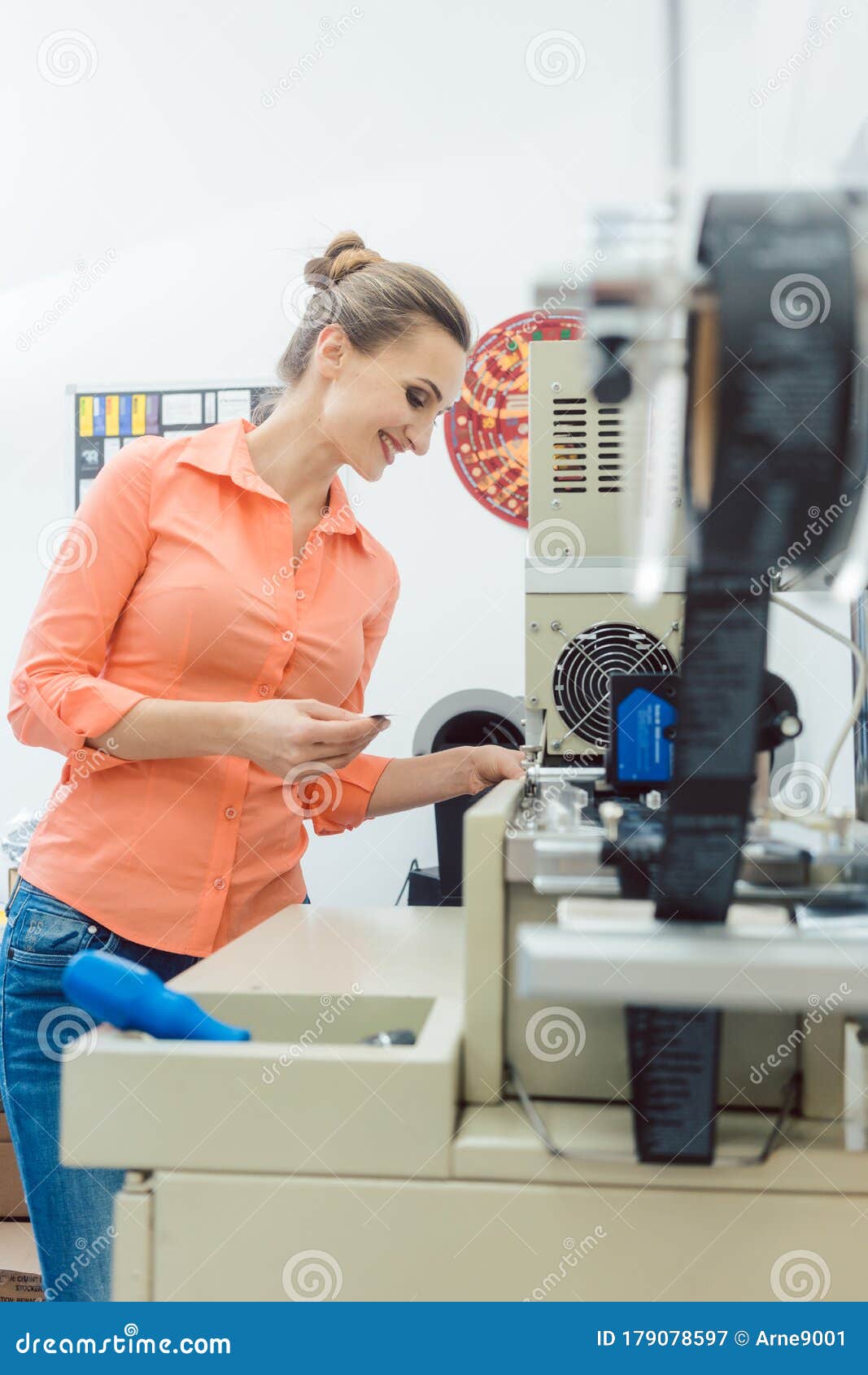 Worker Checking Textile Label Fresh from the Printing Machine Stock ...