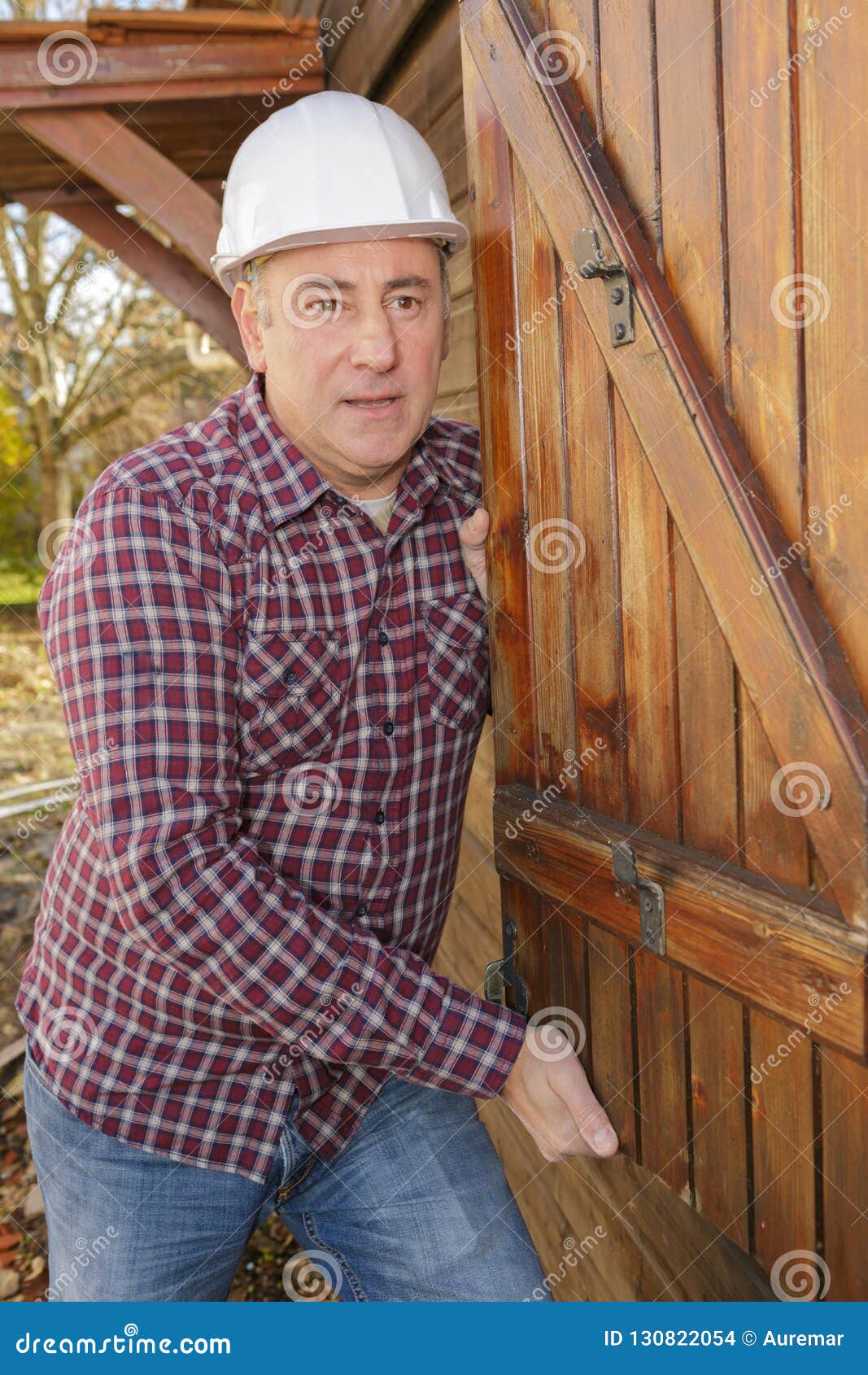 Worker Checking Wood Shutter Stock Photo - Image of roll, frames: 130822054