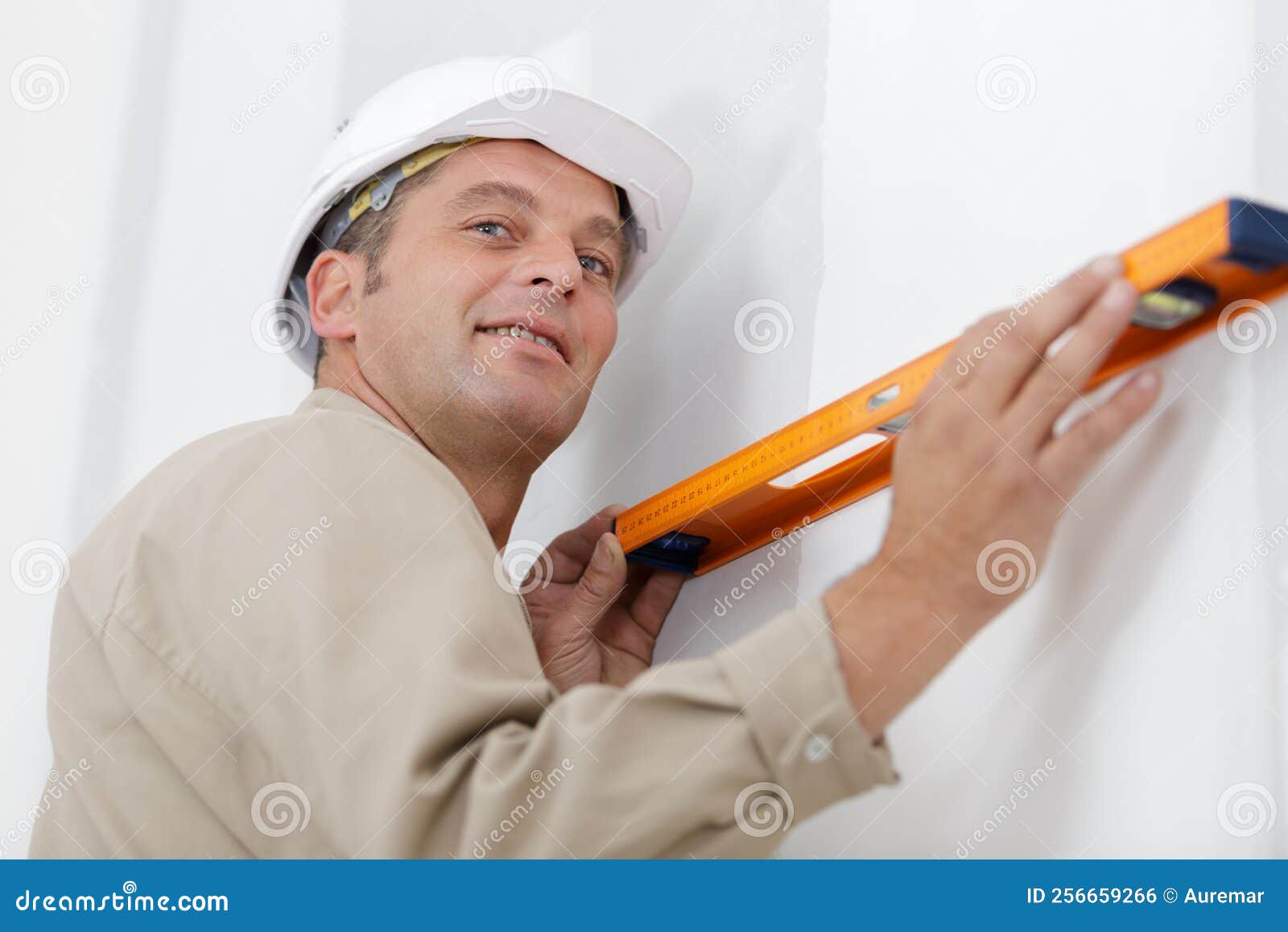 Worker Checks Wall with Level Stock Photo - Image of repair, concrete ...