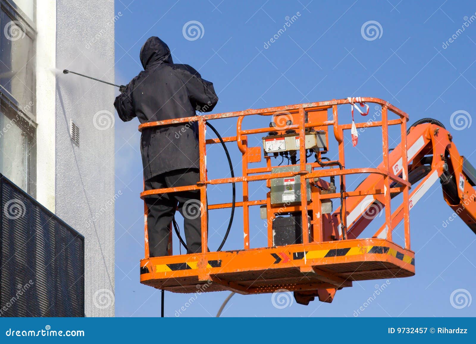 A Worker in a Cherry-picker Stock Image - Image of labor, wash: 9732457