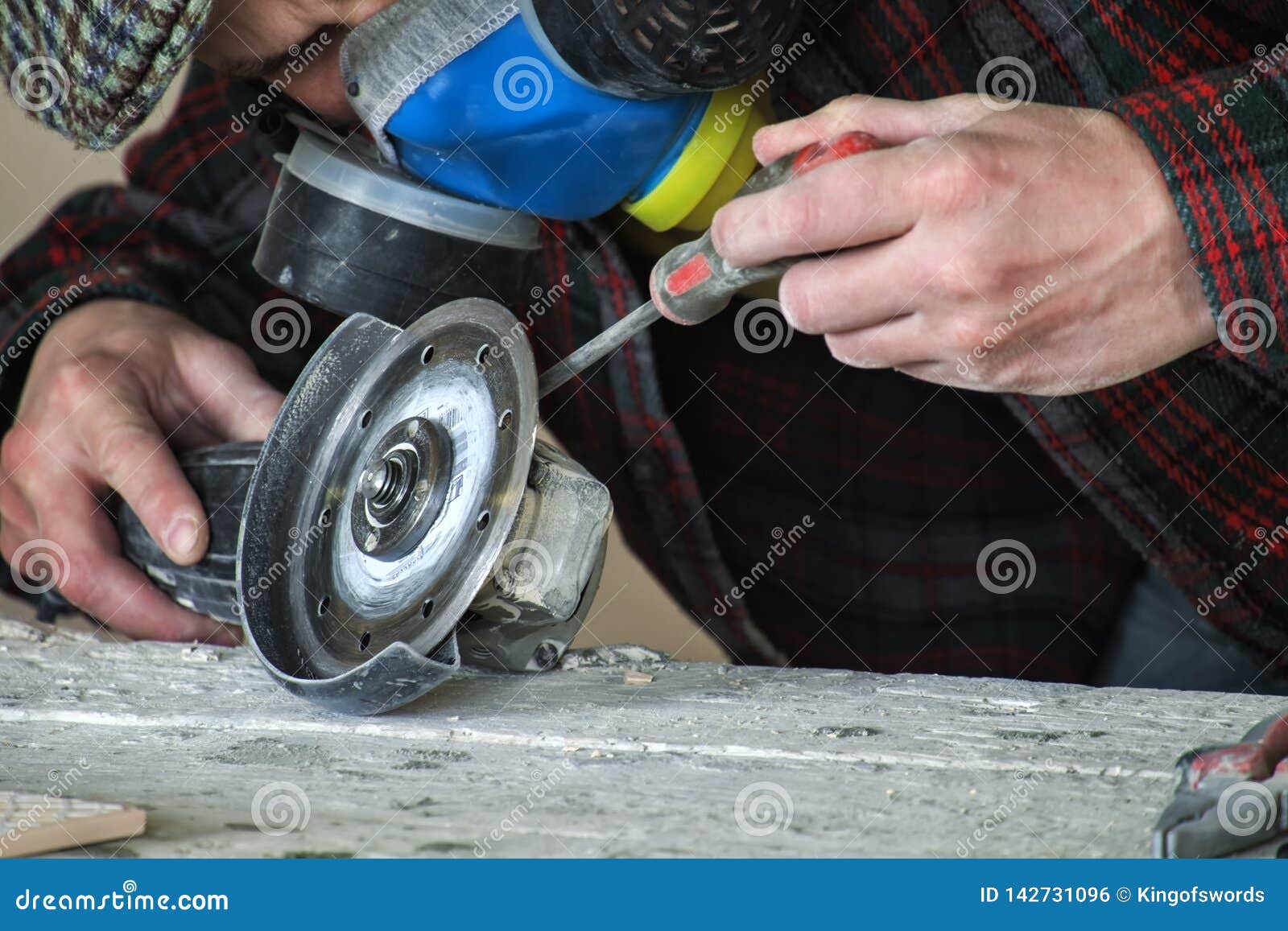 Master Clamps Protective Casing in an Angle Grinder Stock Photo - Image ...
