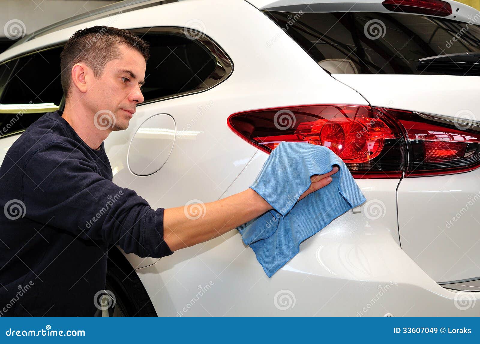 Worker cleaning a car. stock image. Image of white, clean - 33607049
