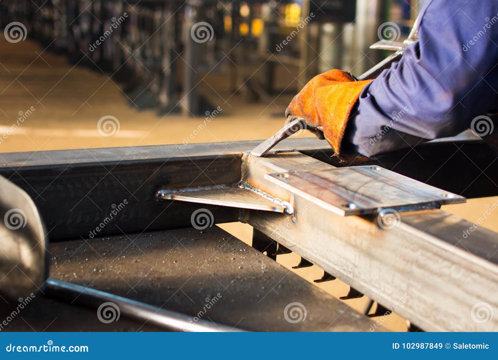 Worker Cleaning Fresh Welded Steel Bar Stock Image - Image of ...