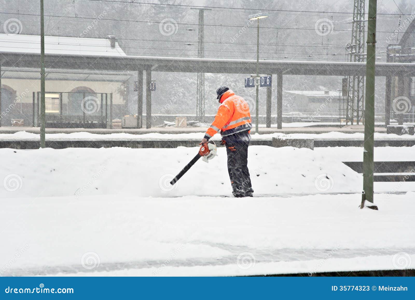 Worker is Cleaning the Platform of a Train Station Stock Image - Image ...