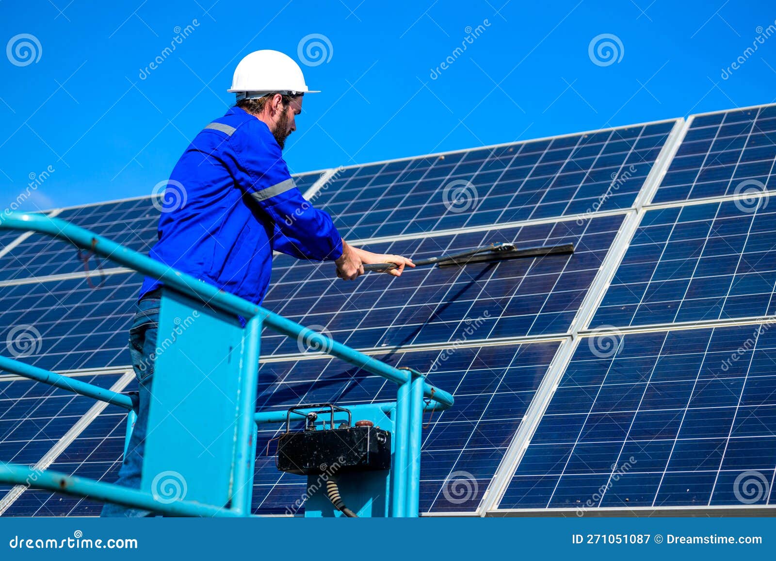 Worker Cleaning Solar Panel at Solar Cell Farm Stock Image - Image of ...