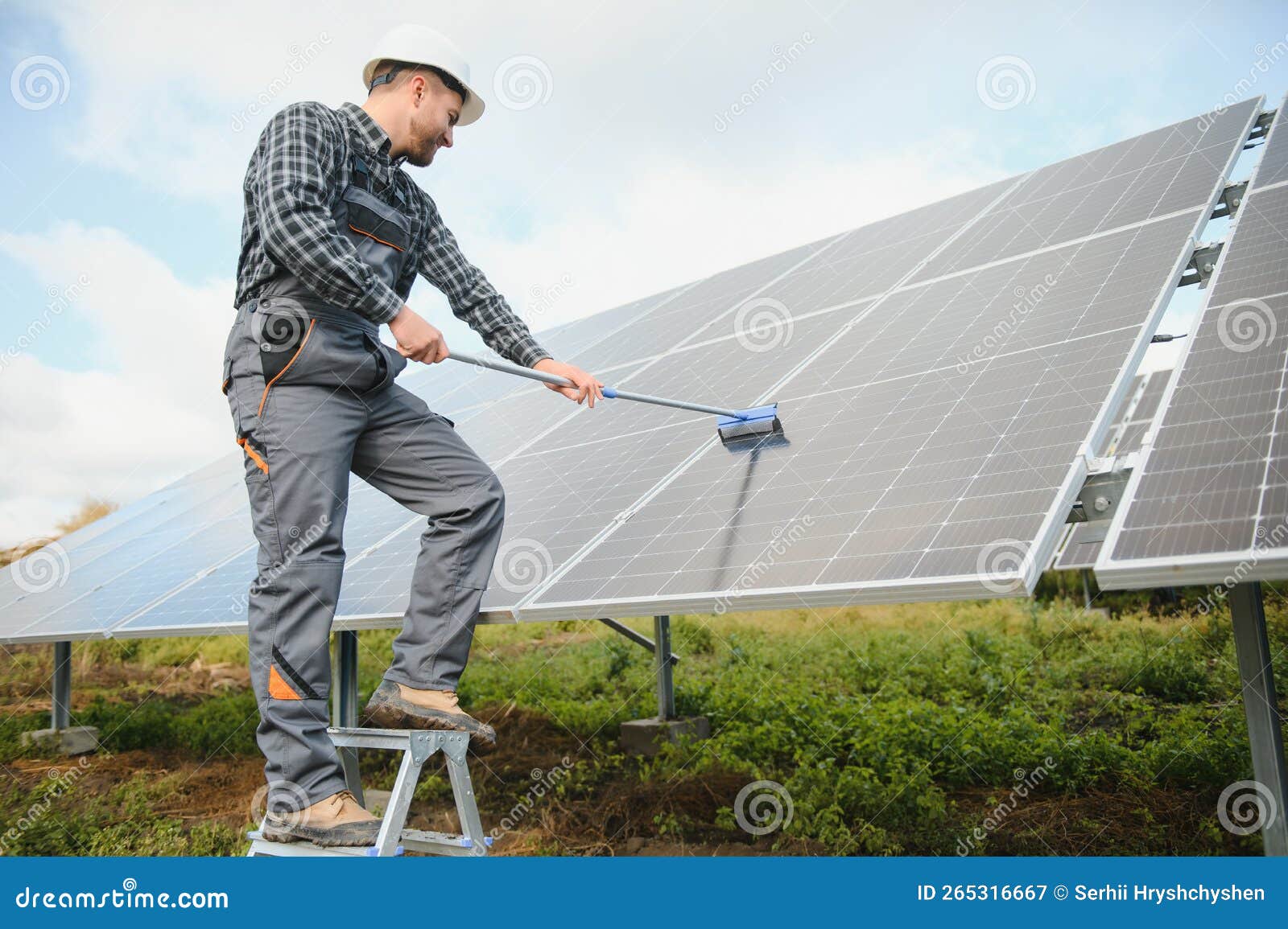 Worker Cleaning Solar Panels after Installation Outdoors Stock Image ...