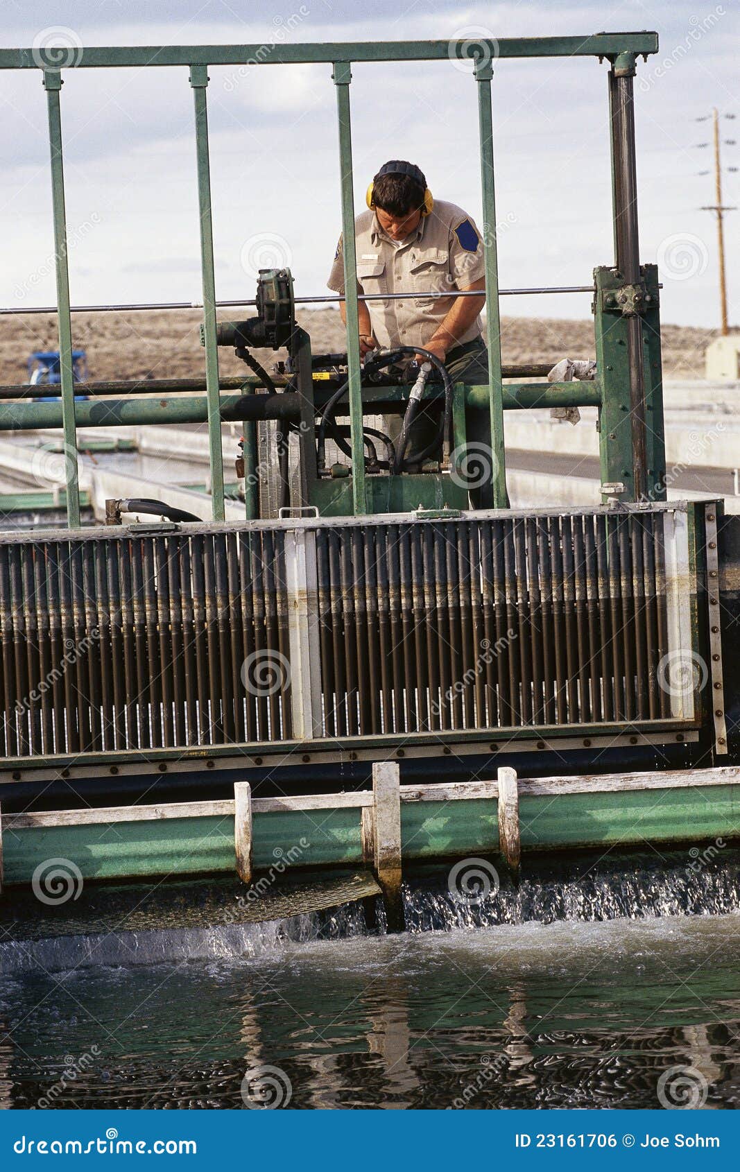 Worker cleaning water editorial photo. Image of photograph - 23161706