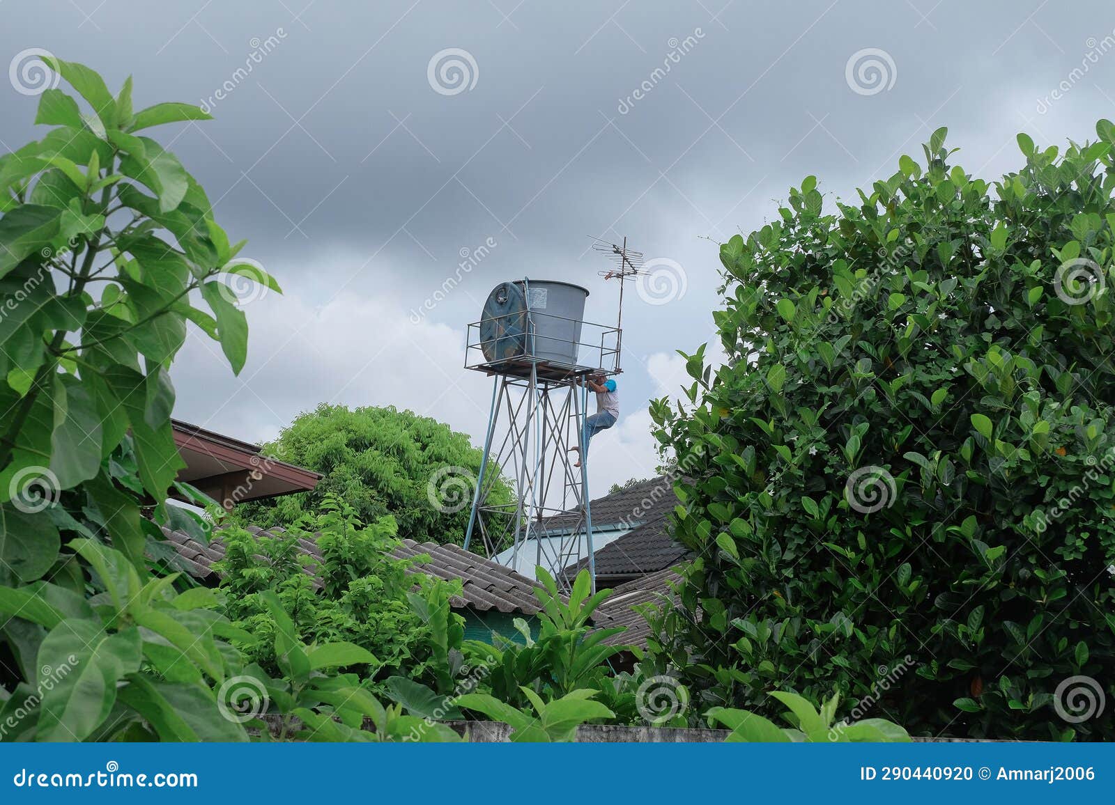 Worker Cleaning in Water Tank on the Tower. Water Storage Stock Photo ...