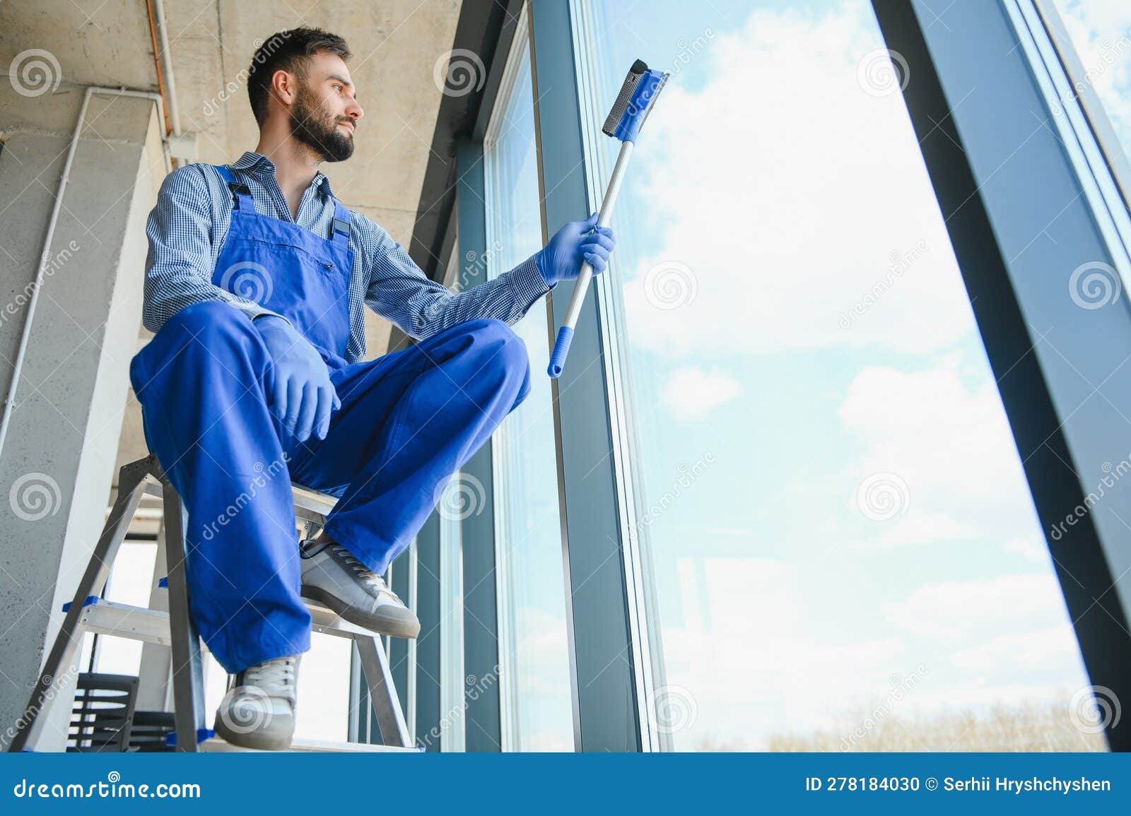 Worker Cleaning Windows Service on High Rise Building Stock Photo ...