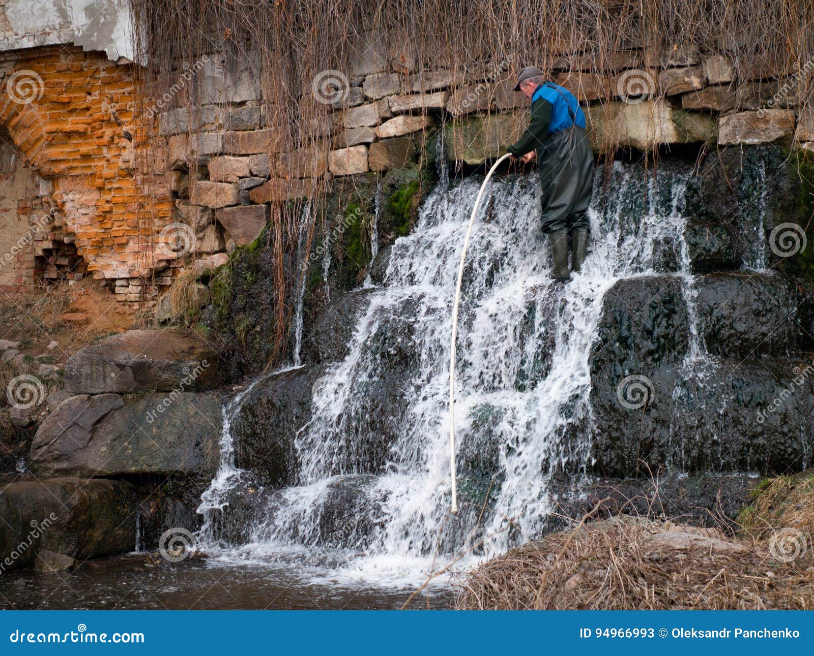 Worker Cleans the Old Waterfall Editorial Stock Photo - Image of maple ...