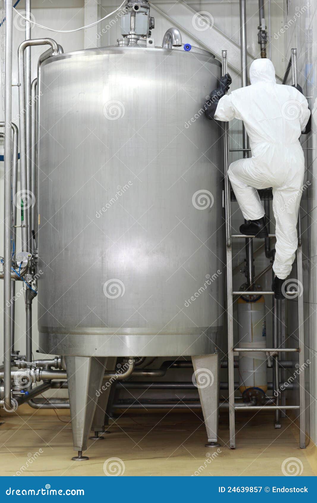 Worker Climbing a Ladder on Industrial Tank Stock Image - Image of ...