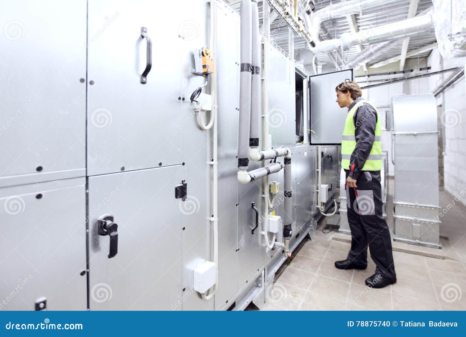 Worker at CNC plant stock photo. Image of inspect, station - 78875740