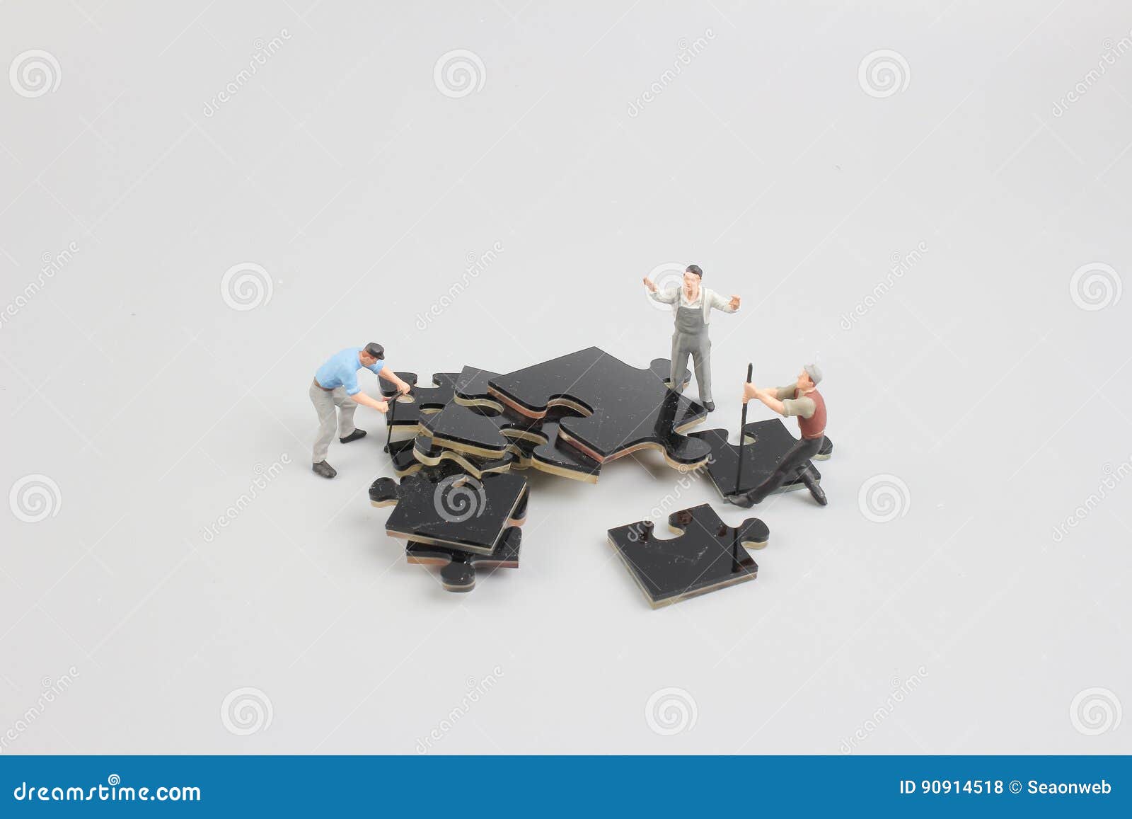 Worker Collaborate Holding Up Jigsaw Puzzle Pieces Stock Photo - Image ...