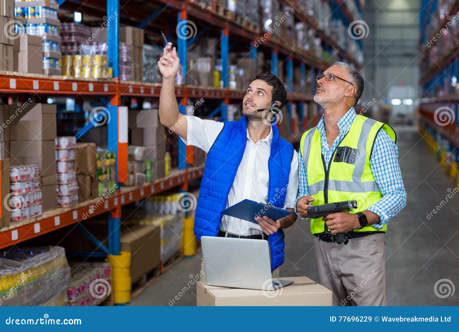 Worker Colleague Looking Up Stock Image - Image of container, adult ...