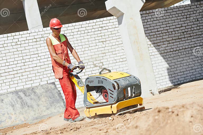 Worker with Compaction Machine Stock Photo - Image of craftsperson ...