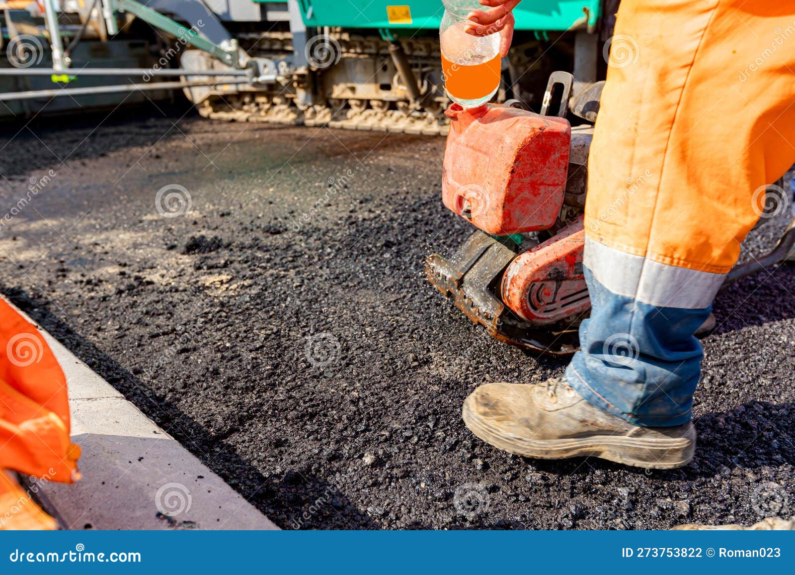 Worker Compacts Tarmac Using Vibration Plate Compactor Stock Photo ...