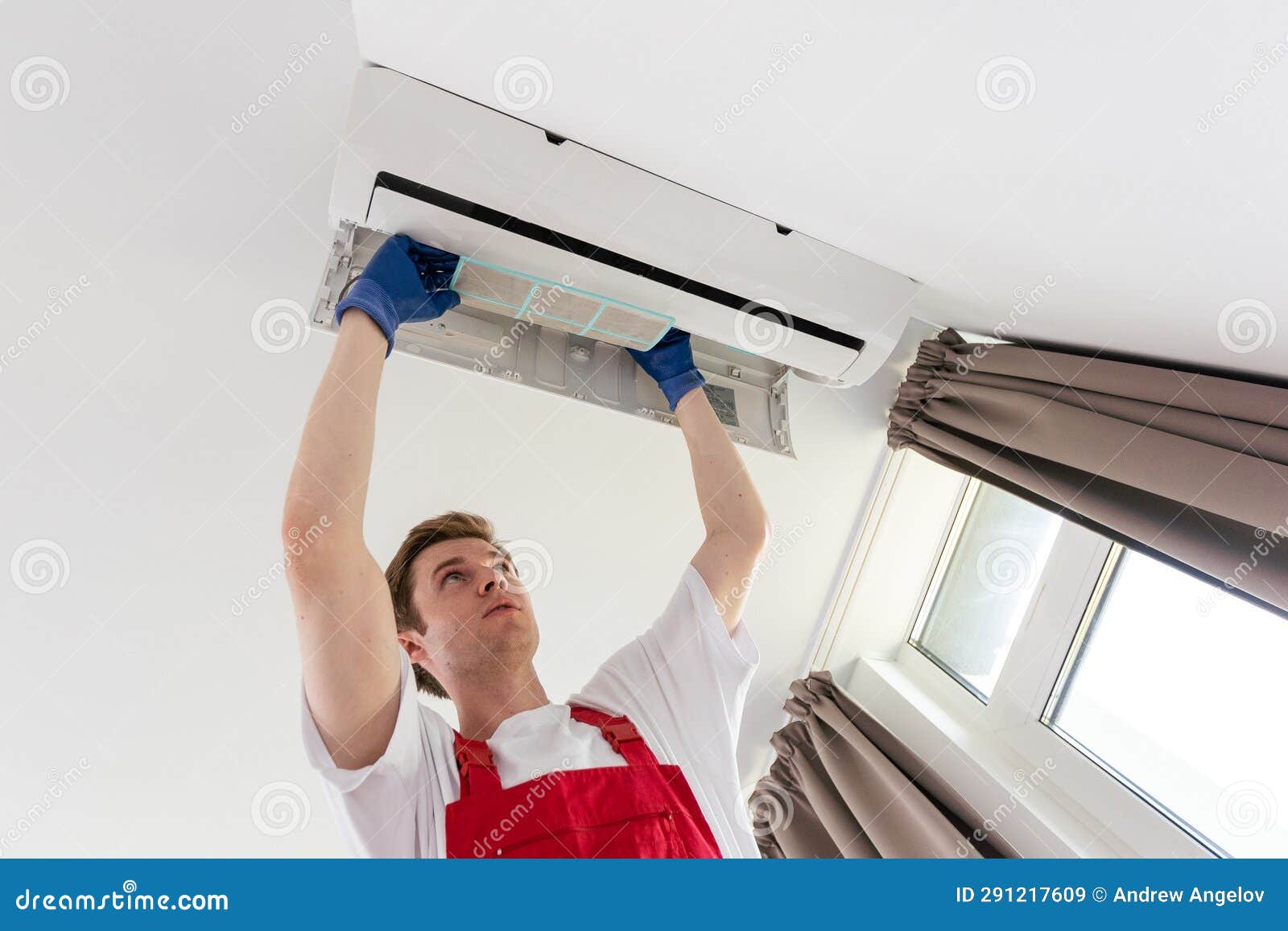 The Worker Connecting a New Air Conditioner Unit Stock Image - Image of ...