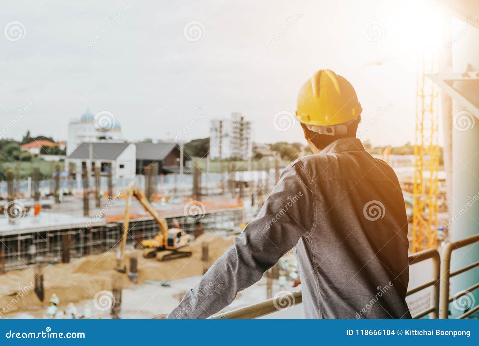 Worker in a Construction Site Stock Photo - Image of plan, helmet ...