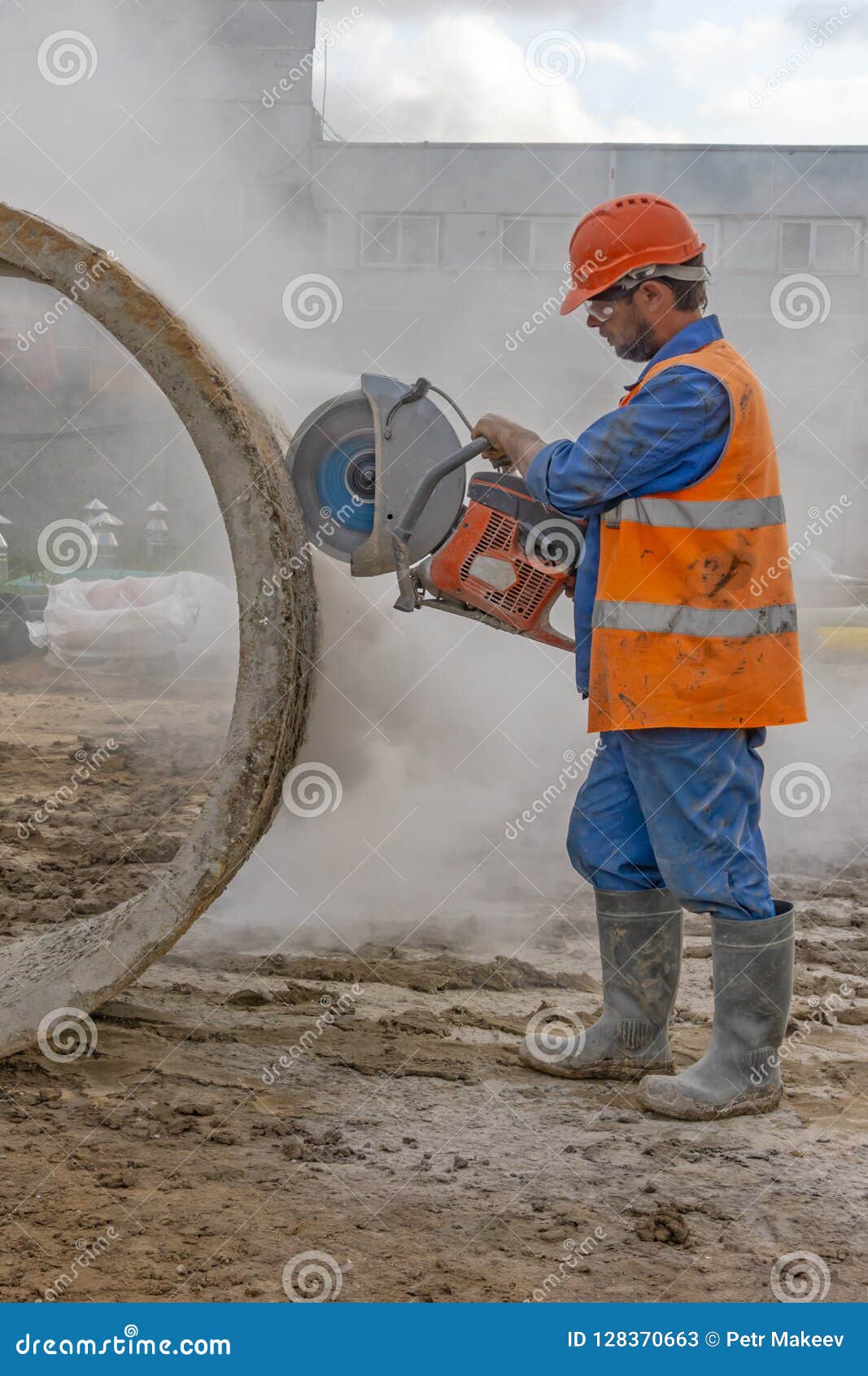 Builder in Orange Uniform with a Concrete Cutter Stock Image - Image of ...