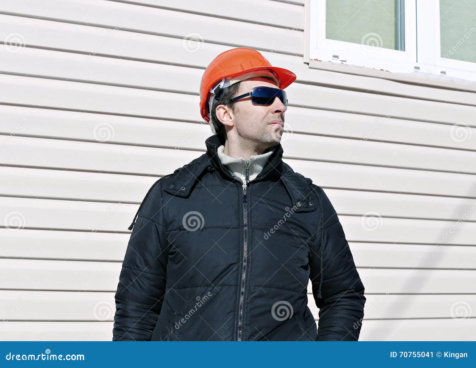 Worker on a Construction Site Looks and Compares Work Done Stock Image ...