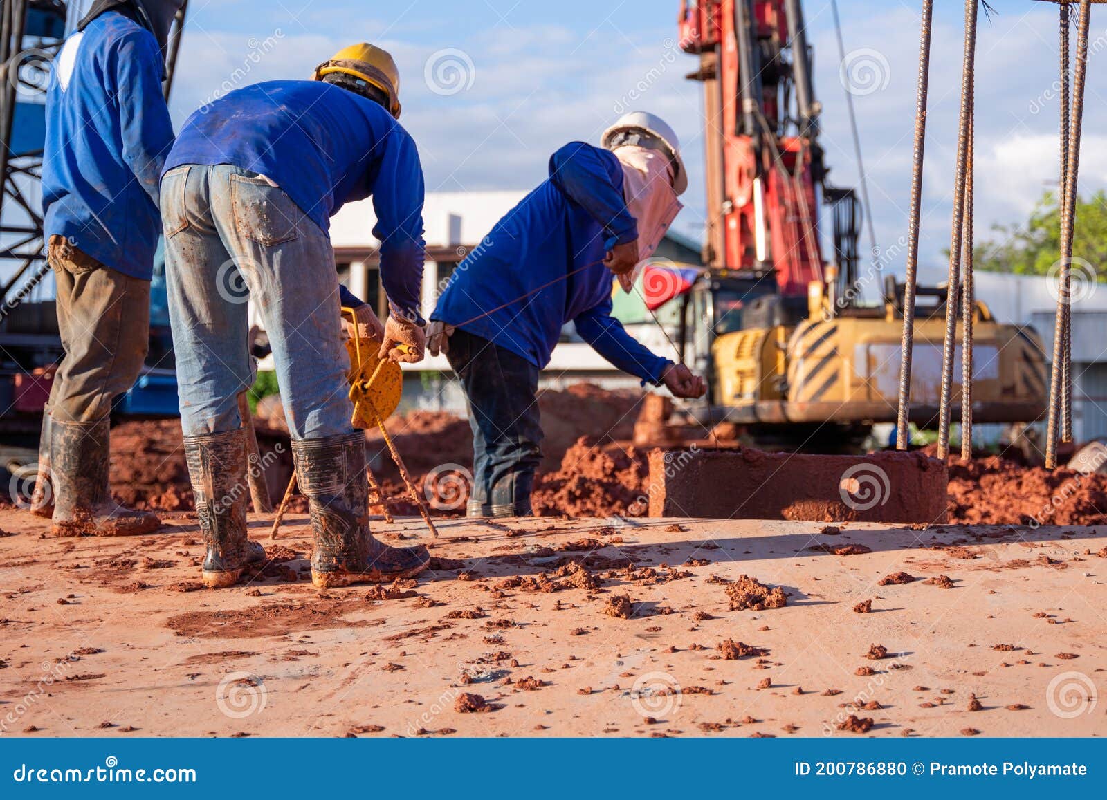 Worker at the Construction Site Measures the Depth of Pit for Pouring ...
