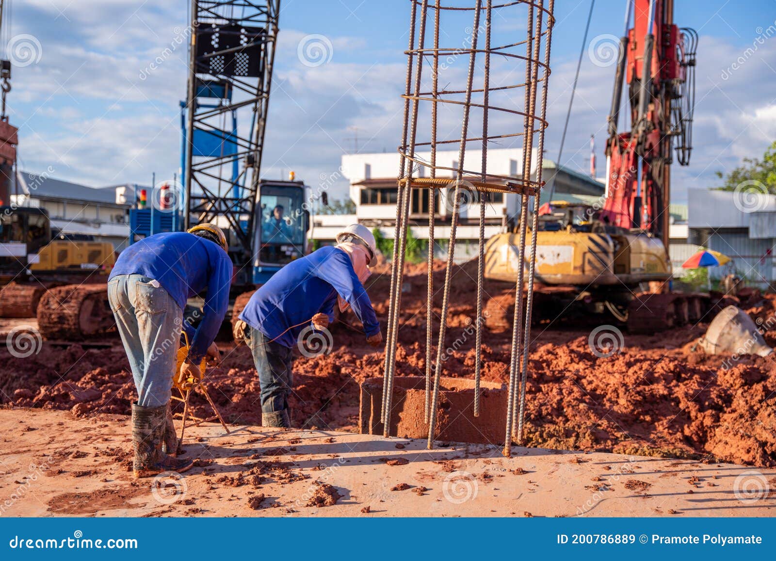 Worker at the Construction Site Measures the Depth of Pit for Pouring ...