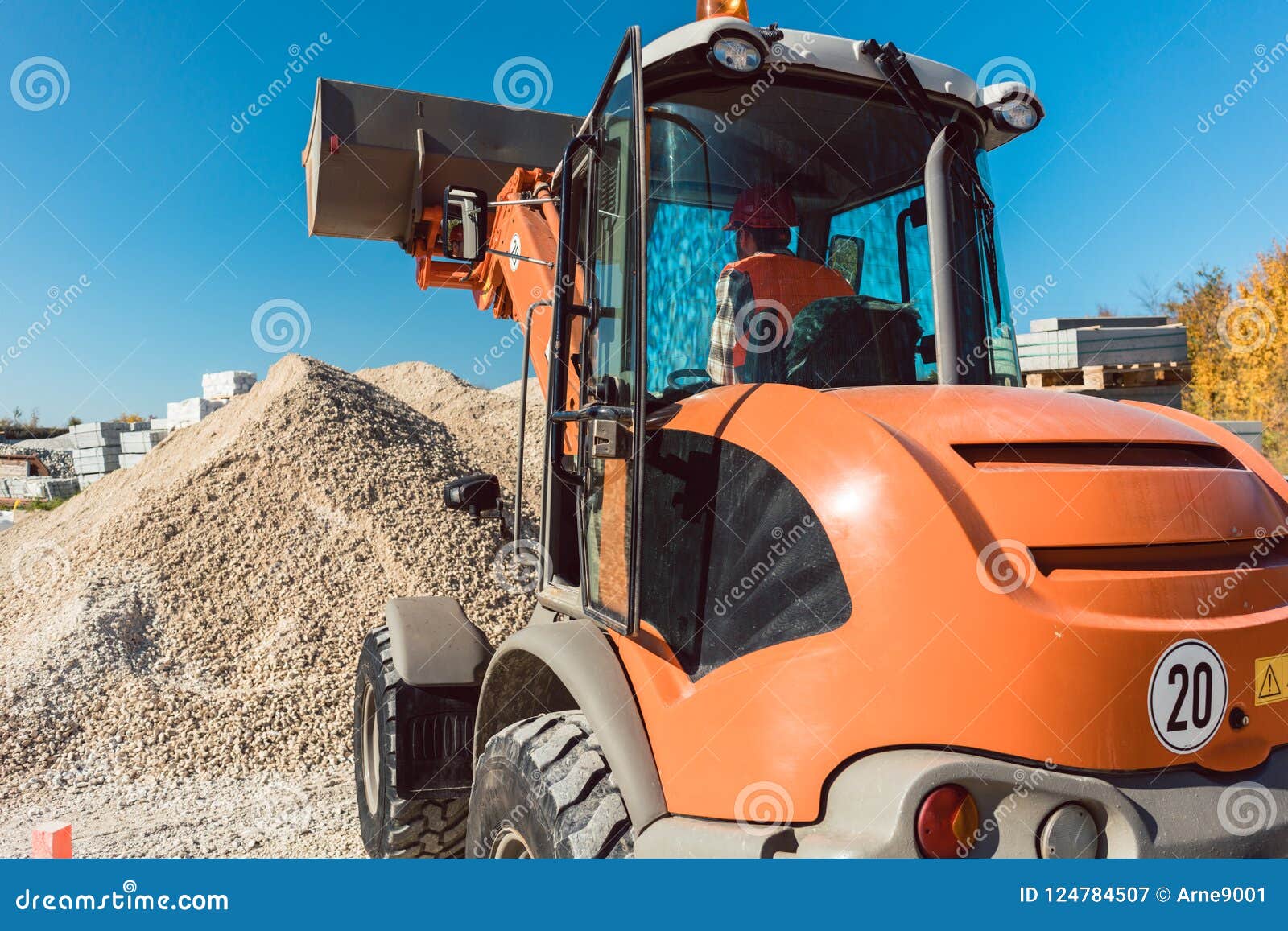 Worker on Construction Site Operating Wheel Loader Stock Image - Image ...