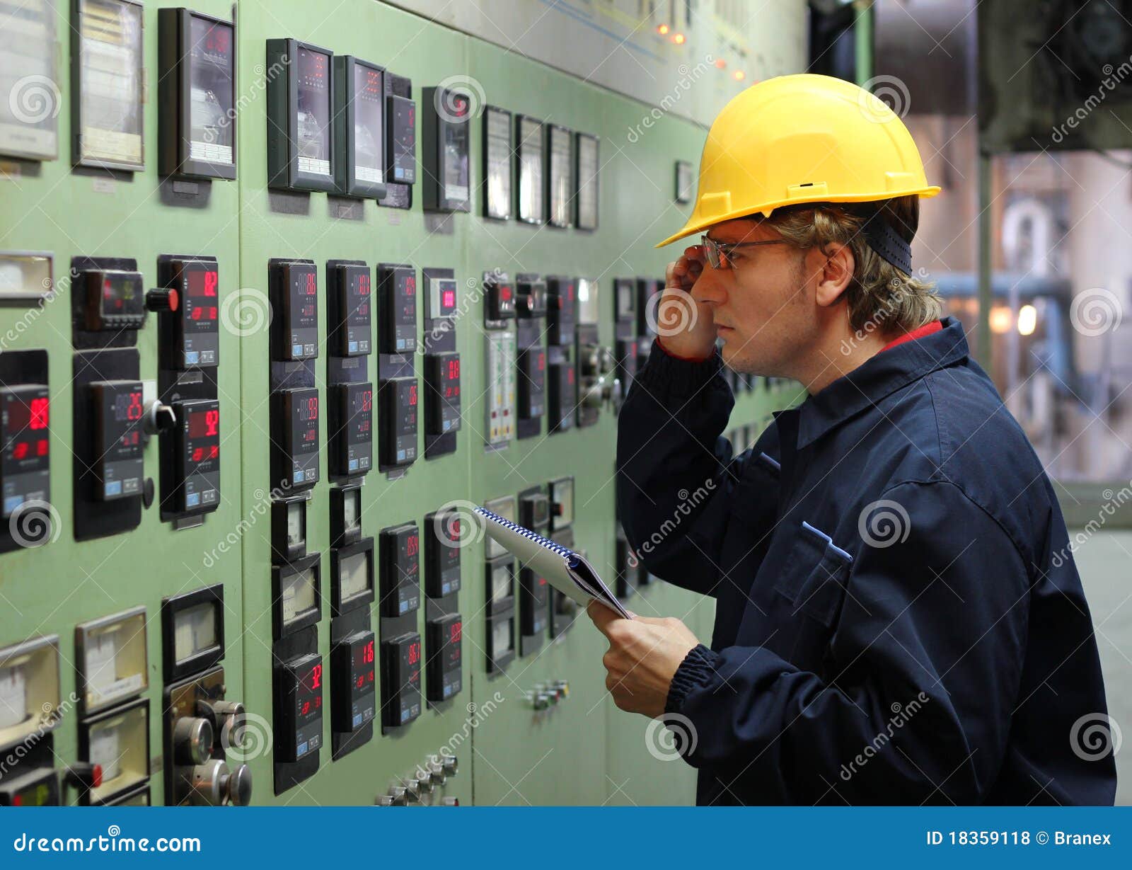 Worker in a Control Room stock photo. Image of measurements - 18359118