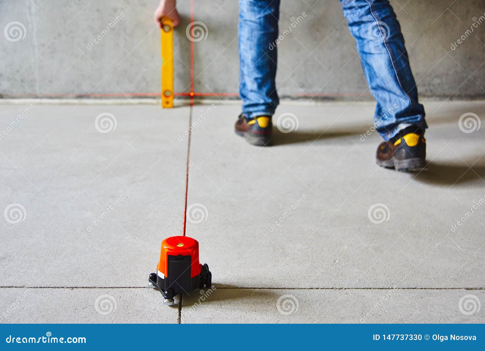The Worker Control Works of Walls Using Laser Line Level. Laser ...