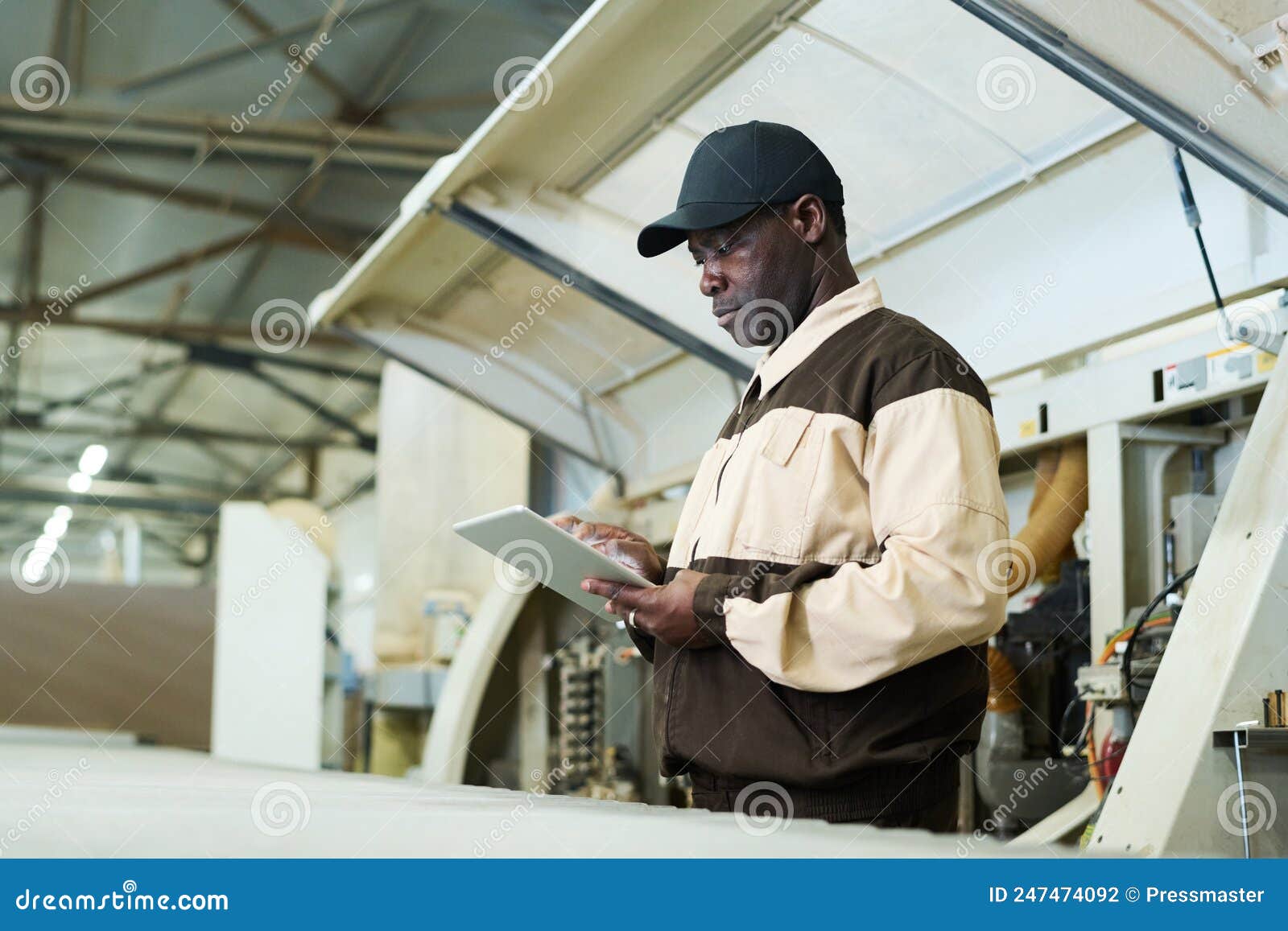 Worker Controlling Machine with Tablet Stock Photo - Image of equipment ...
