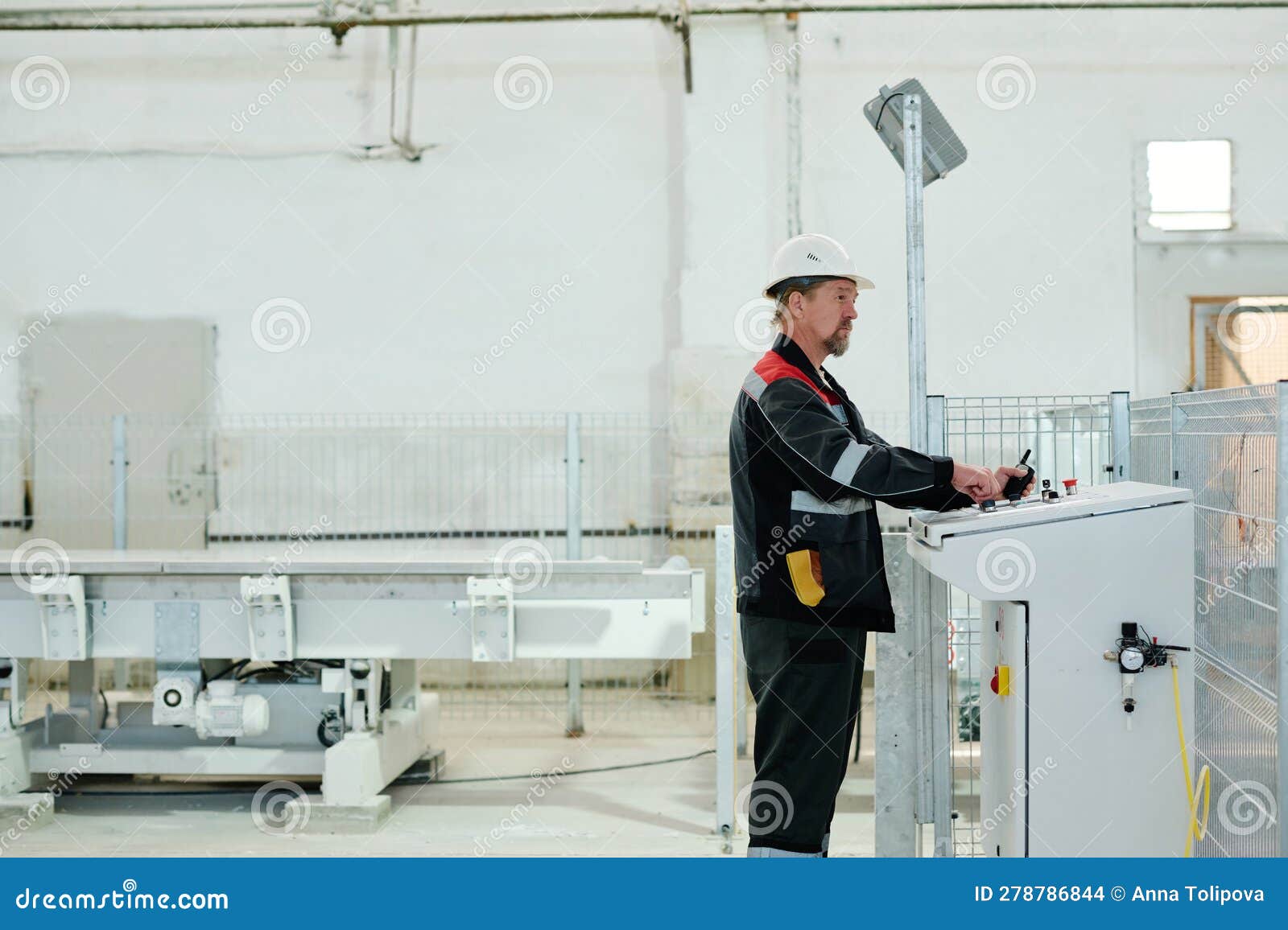 Worker Controlling the Work at Machine Stock Photo - Image of work ...