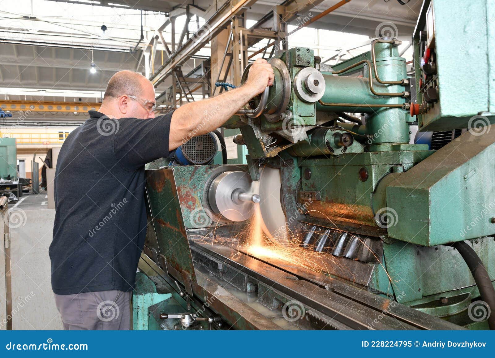The Worker Controls the Feed of the Grinding Wheel when Grinding the ...