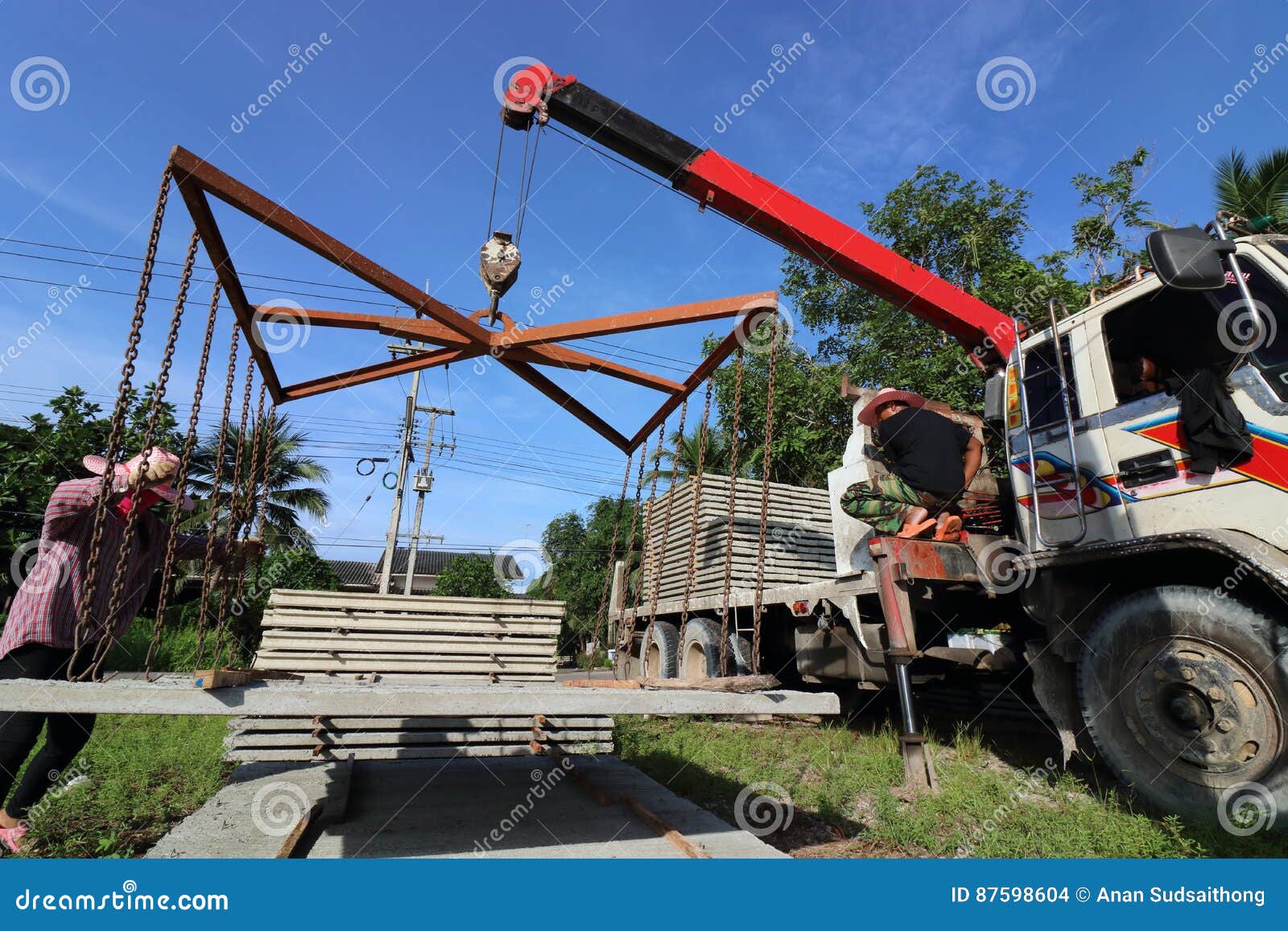 Worker Controls of Lifting Crane for Transporting Concrete Slabs ...
