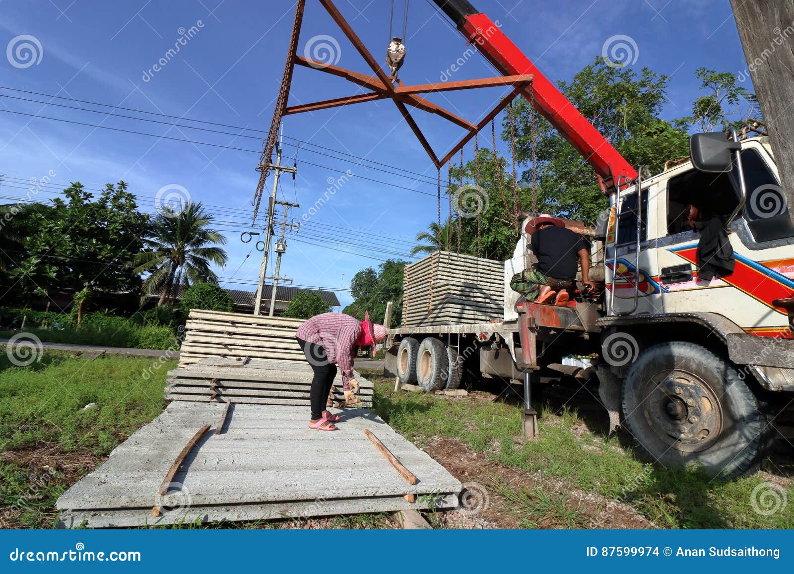 Worker Controls of Lifting Crane for Transporting Concrete Slabs ...