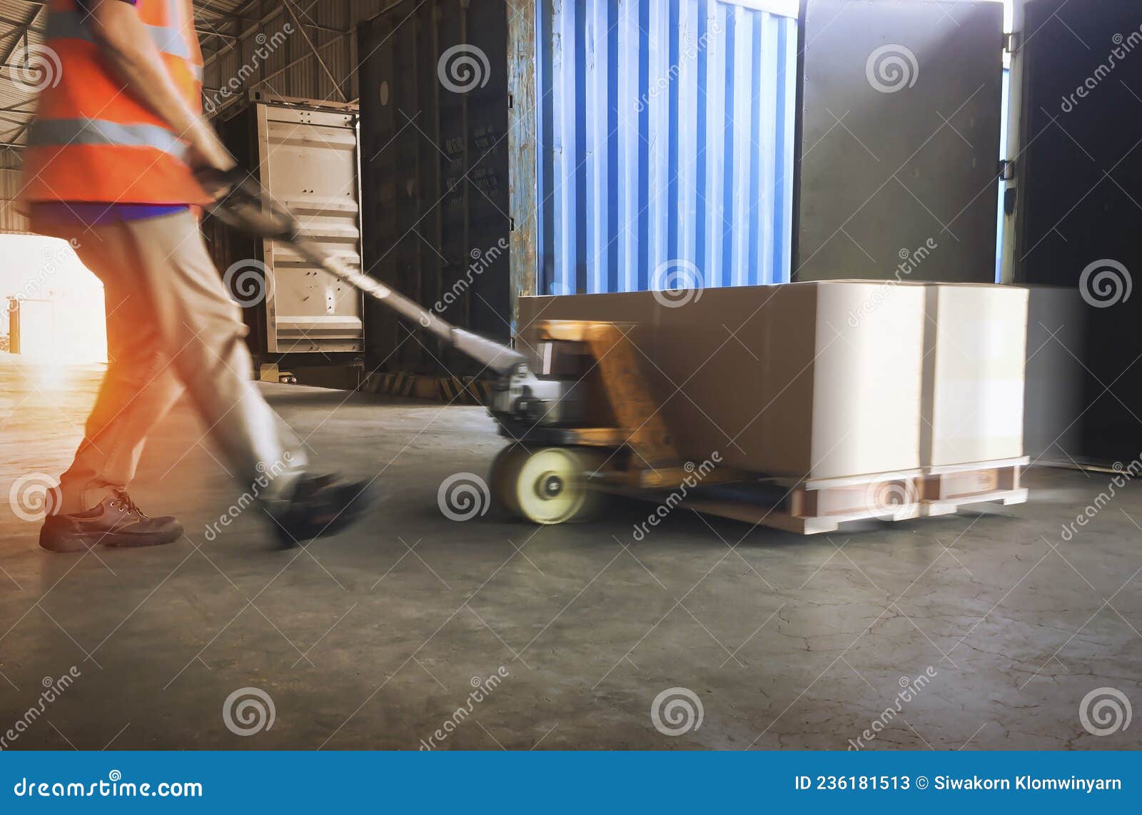 Worker Courier Using Hand Pallet Jack Unloading Package Boxes into ...