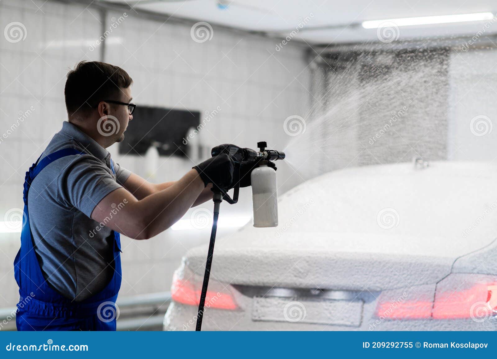 Worker Covering Automobile with Foam at Car Wash. Stock Image - Image ...