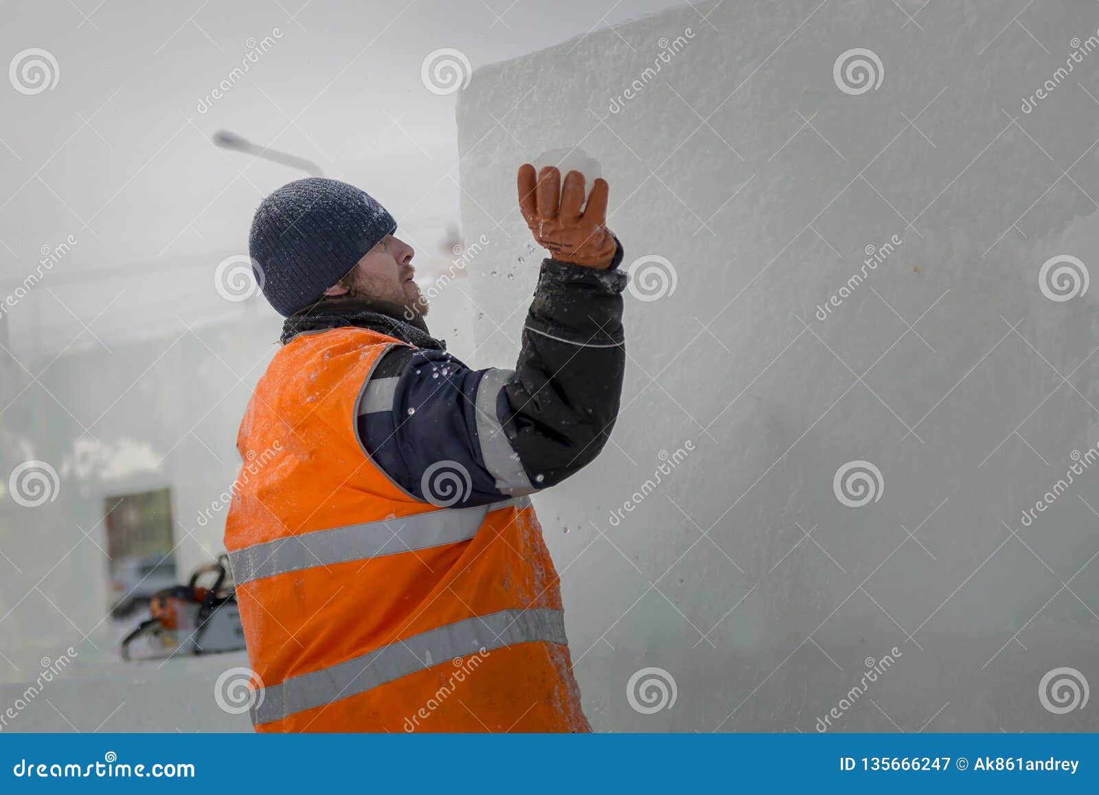 Worker Covers the Joints of Ice Panels with Wet Snow Stock Image ...