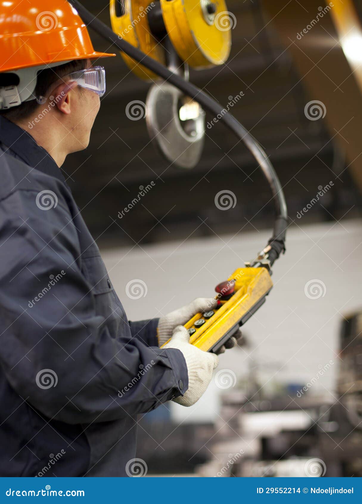 Worker and crane hook stock photo. Image of machinery - 29552214