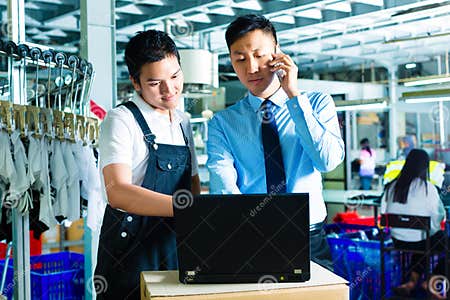 Worker and Customer Service of a Factory Stock Photo - Image of asians ...