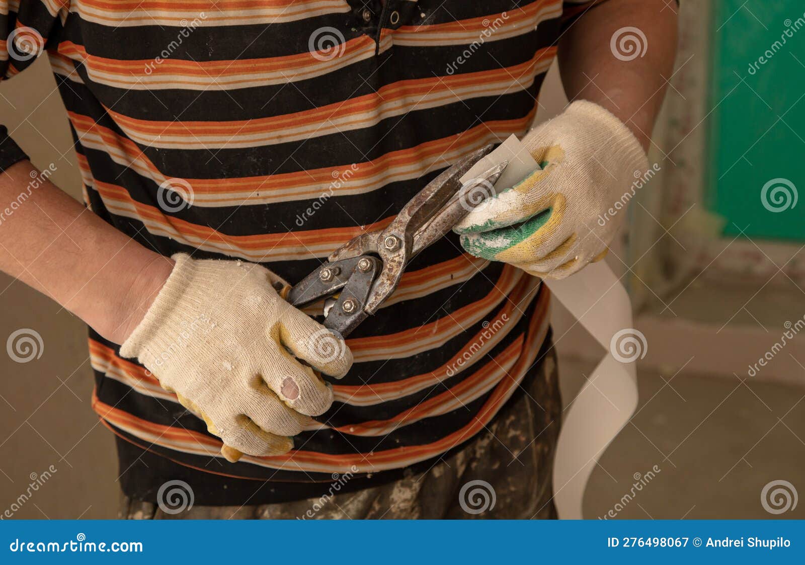 Worker Cut Construction Tape with Scissors Stock Image - Image of ...