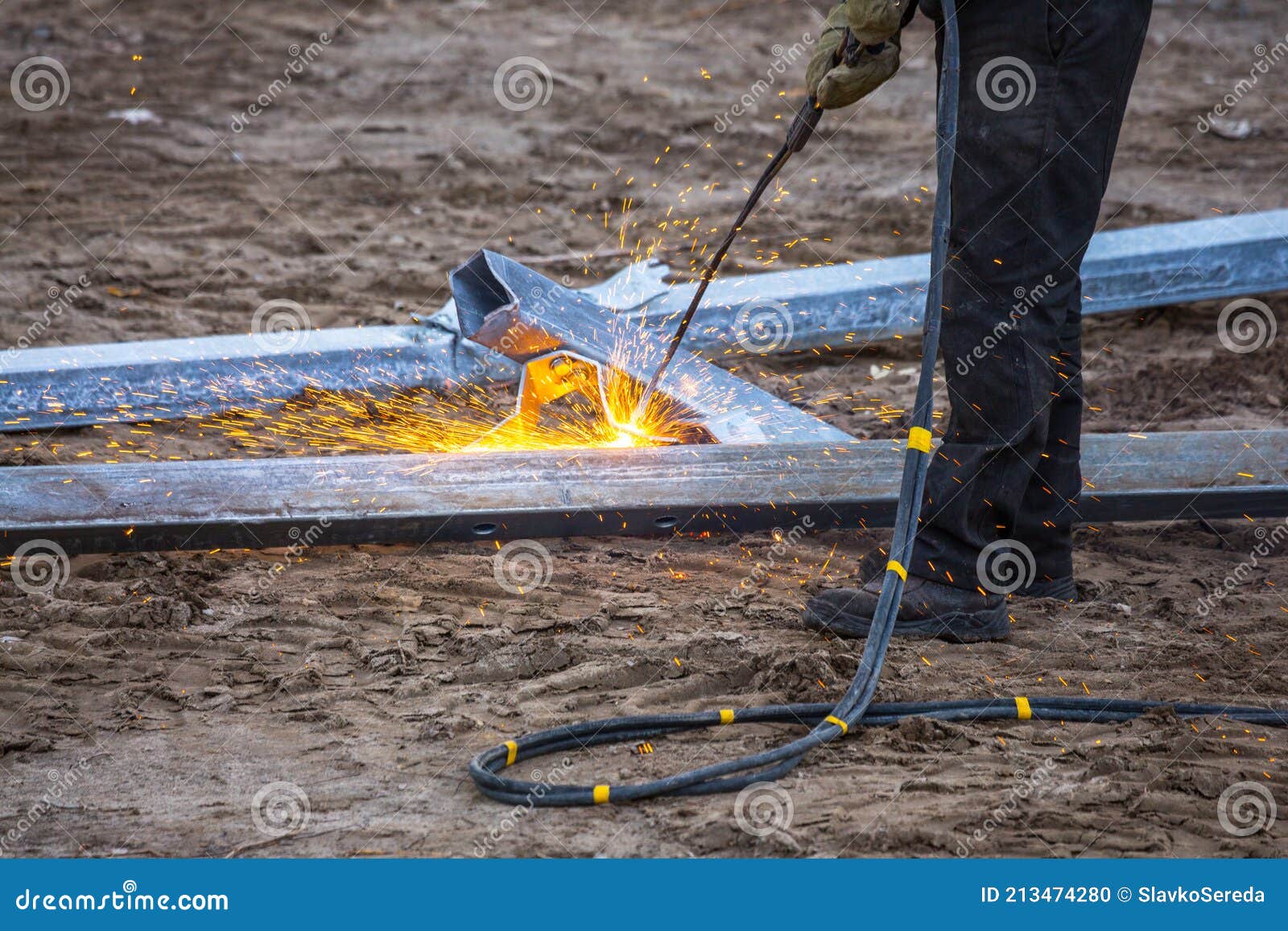 A Worker Cut Steel Beams Using Propane-oxygen Torch. Stock Photo ...