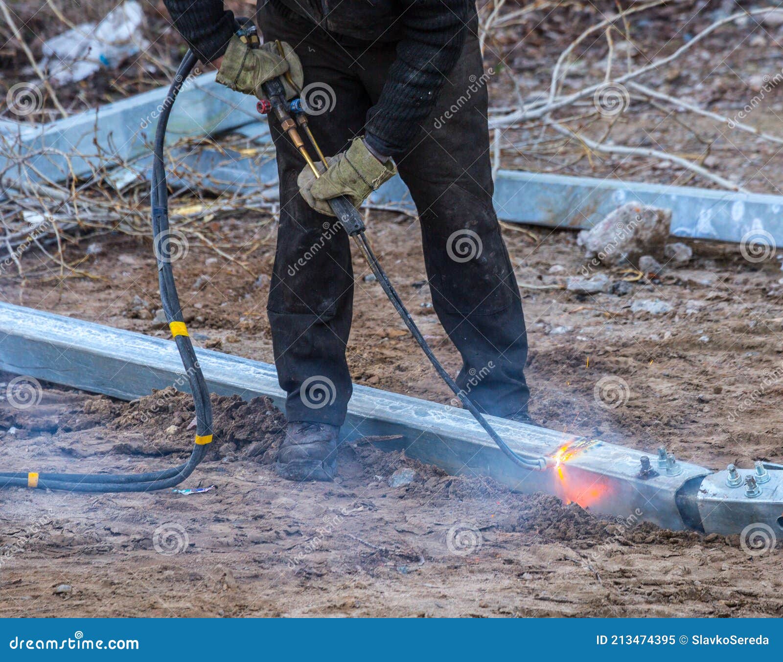 A Worker Cut Steel Beams Using Propane-oxygen Torch. Stock Image ...