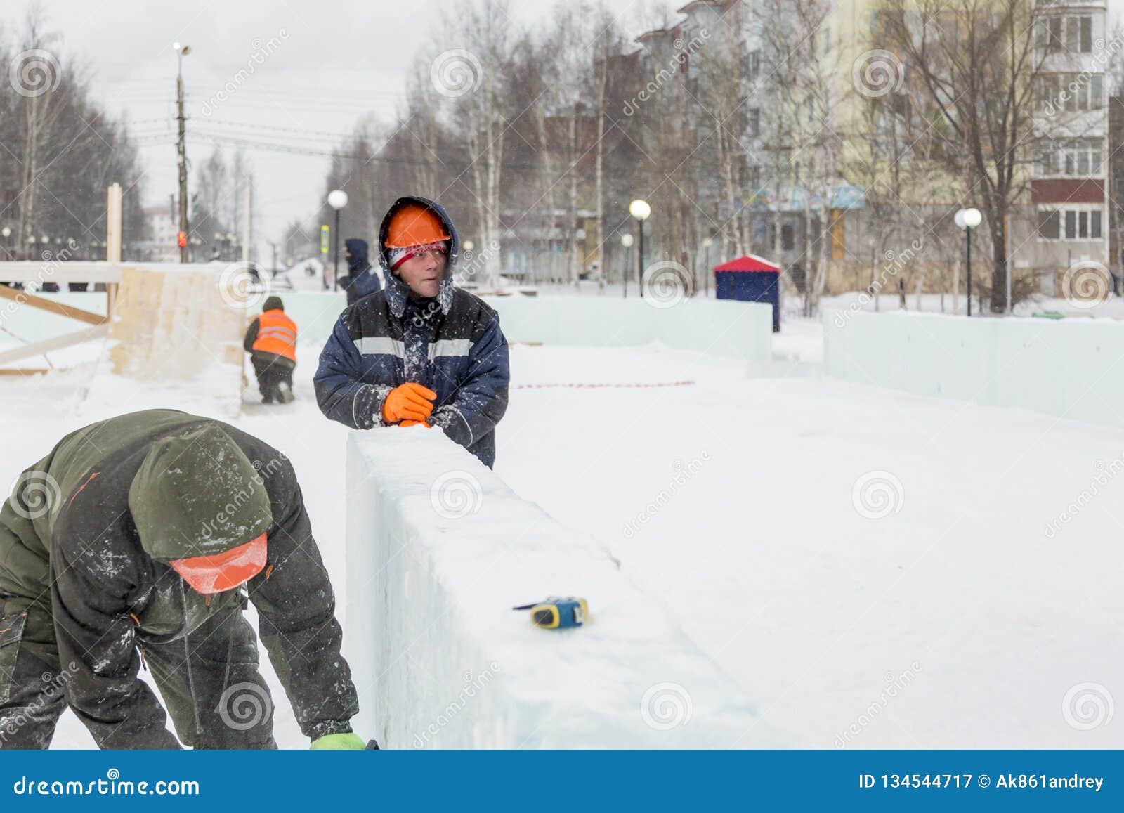 Worker Cuts a Lump of Ice with a Chainsaw Stock Image - Image of folder ...