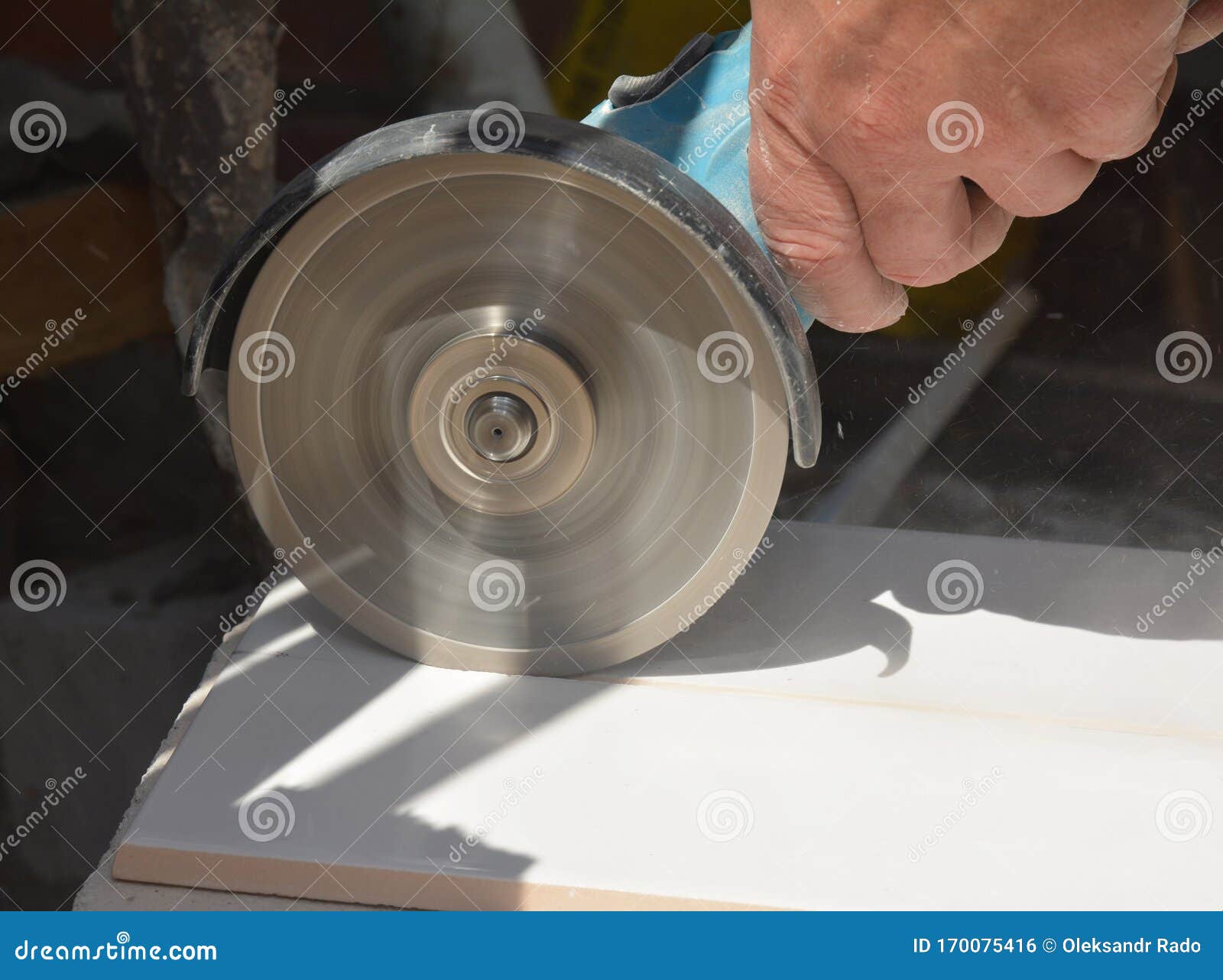 Worker Cutting Ceramic Tile with Disc Grinder Machine Stock Photo ... Worker Cutting Ceramic Tile with Disc Grinder Machine Stock Photo ...