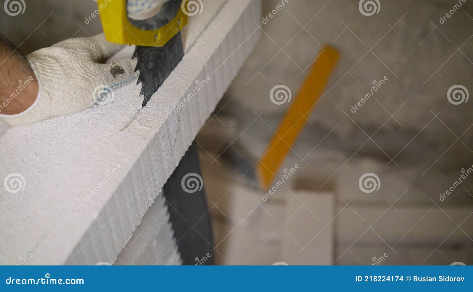 Worker Cutting Construction Blocks Made from Aerated Concrete Using ...