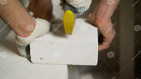 Worker Cutting Construction Blocks Made from Aerated Concrete Using ...