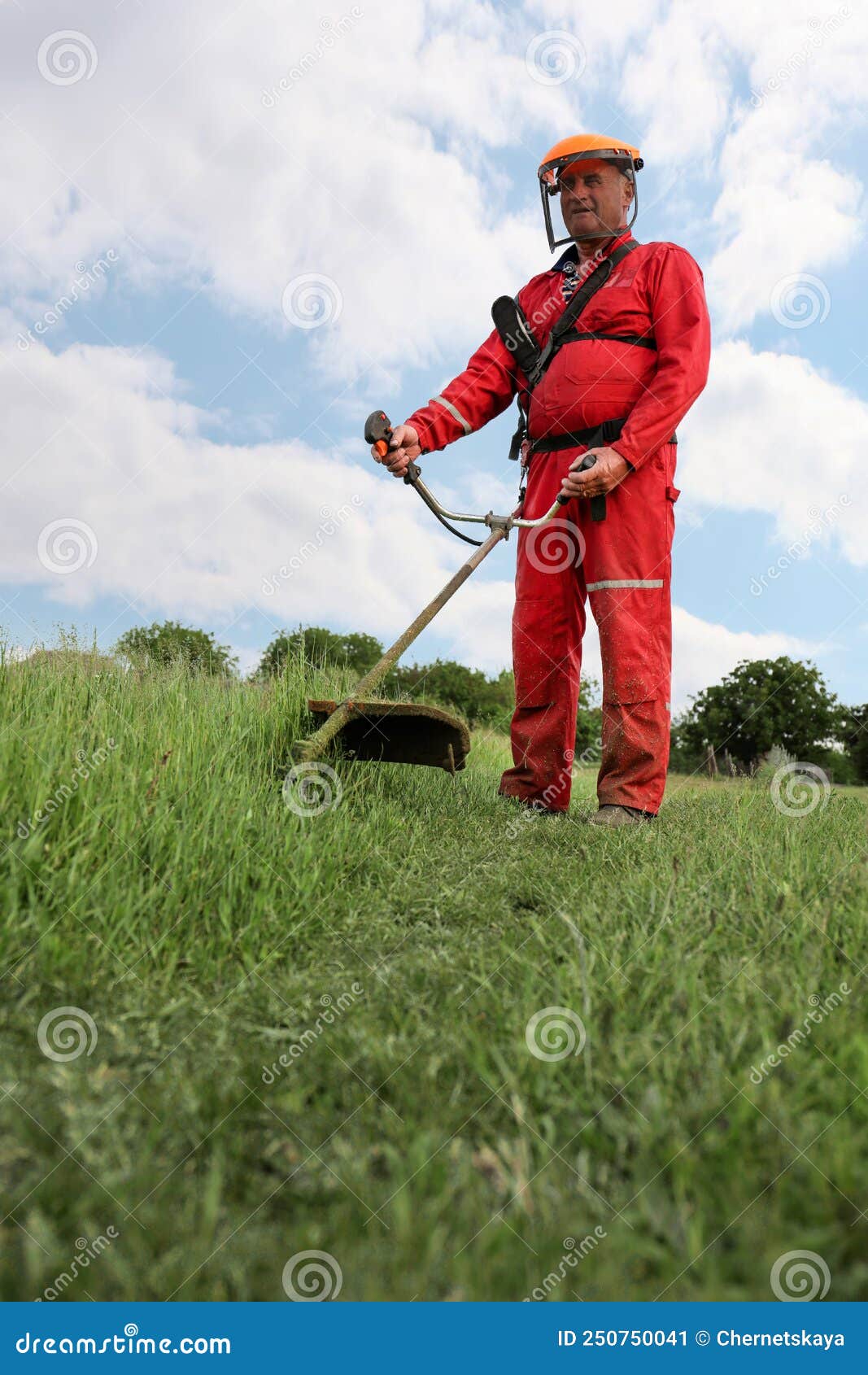 Worker Cutting Grass with String Trimmer Outdoors Stock Image - Image ...