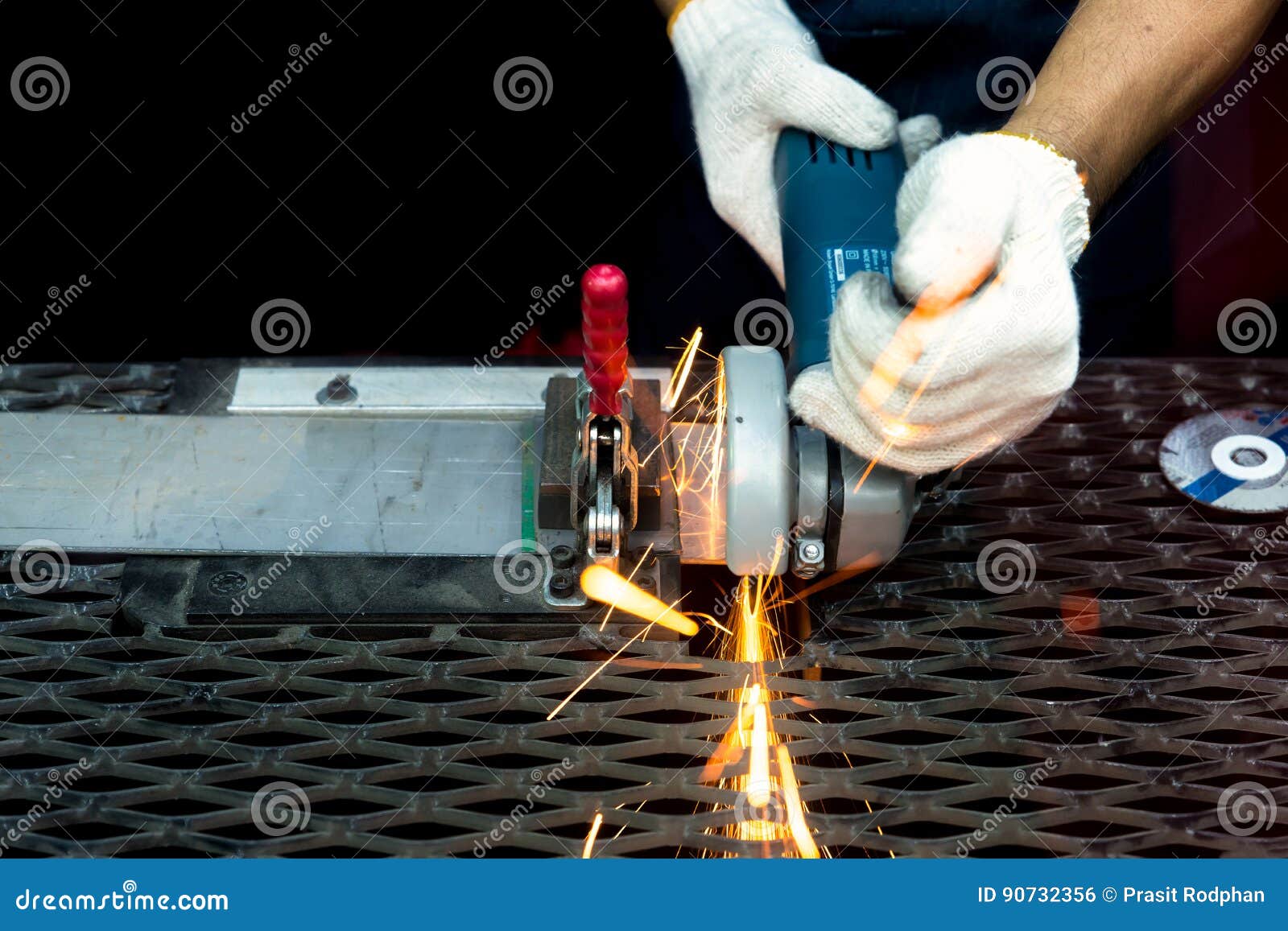 Worker Cutting with Grinder and Welding Metal with Many Sharp Sp Stock ...